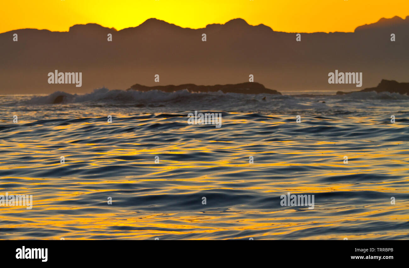 Lights at the break of down, False Bay, South Africa, Africa Stock ...