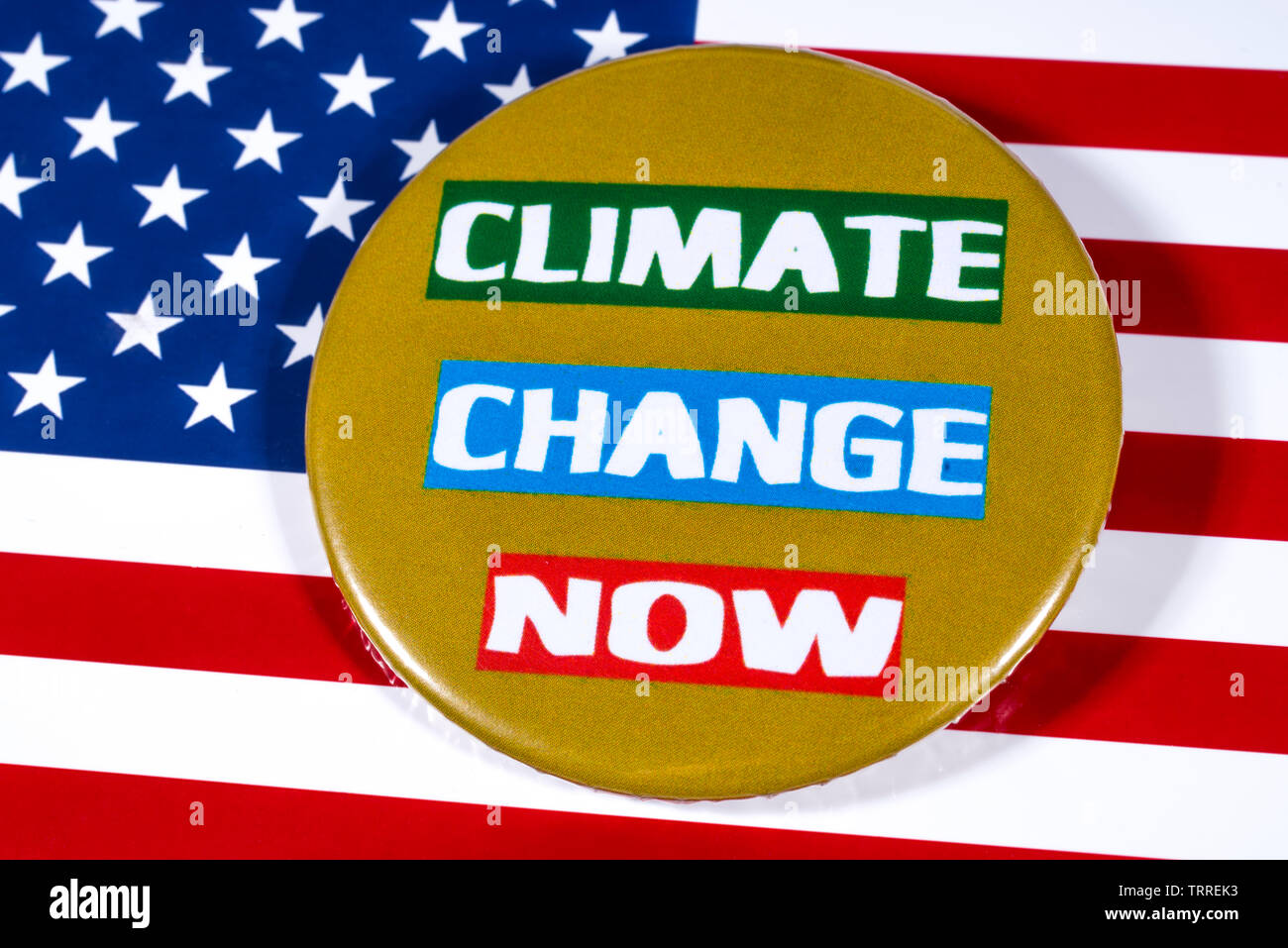 London, UK - May 29th 2019: Climate Change Now badge, pictured over the ...