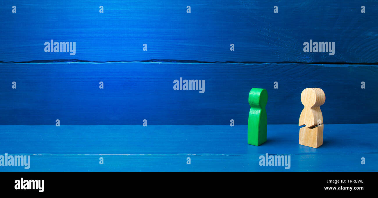 A wooden figure of a man with a crack. Threat of life. Injury and death ...