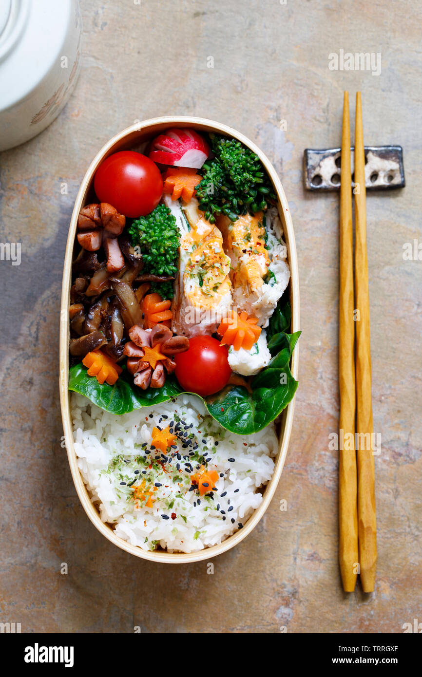 Japanese style bento lunch box with chicken, rice and vegetables Stock ...