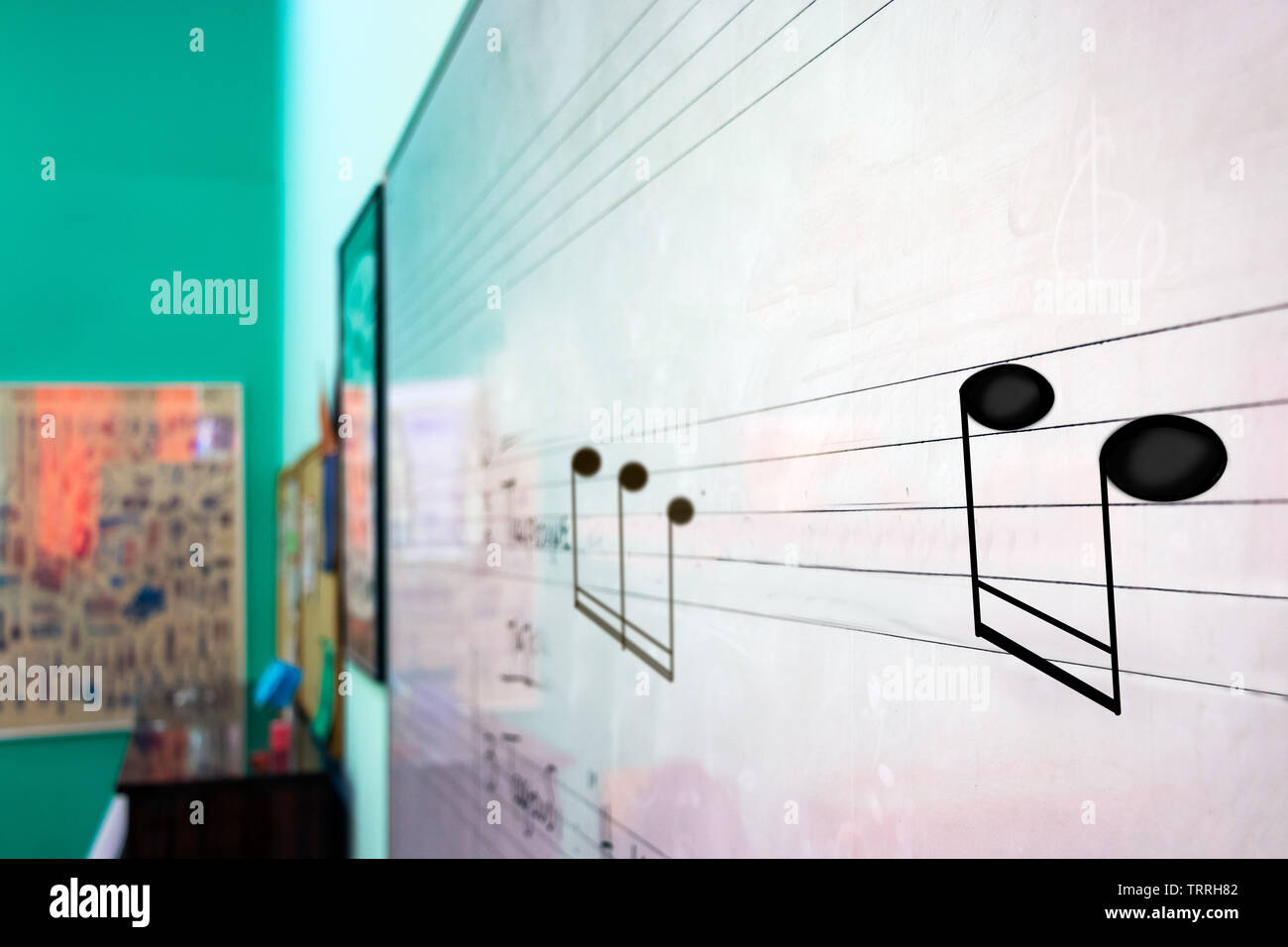 A music whiteboard with staff and semiquaver notes perspective in a ...