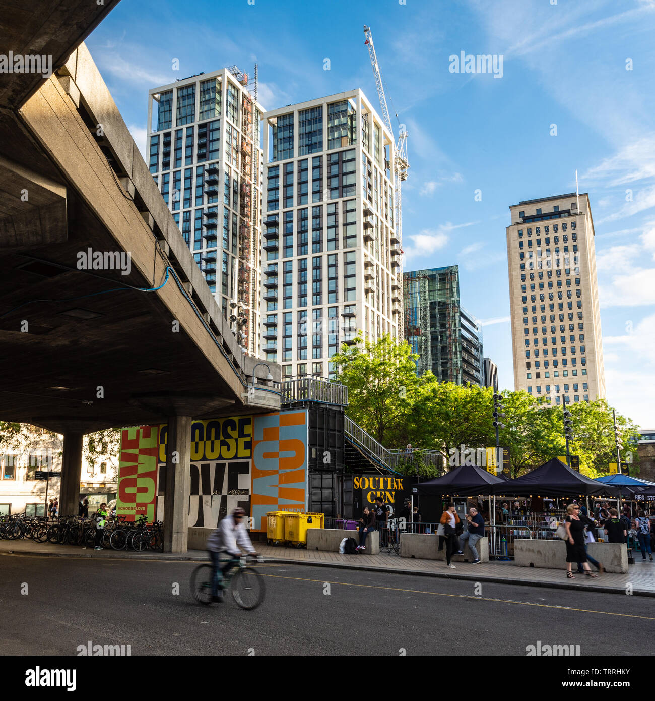 London, England, UK - May 31, 2019: a cyclist rides past the outdoor ...