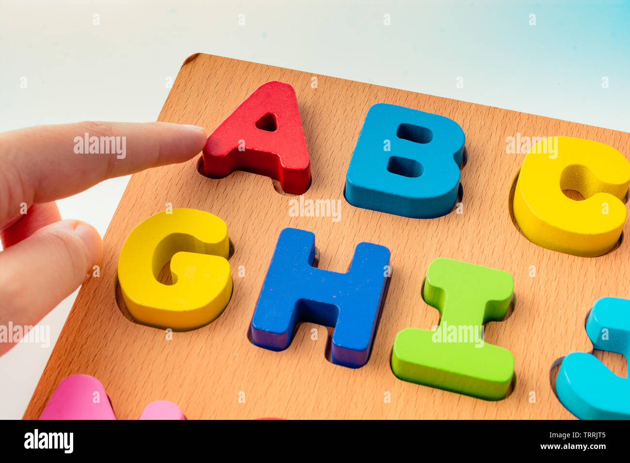 Colorful Letters of Alphabet made of wood Stock Photo - Alamy