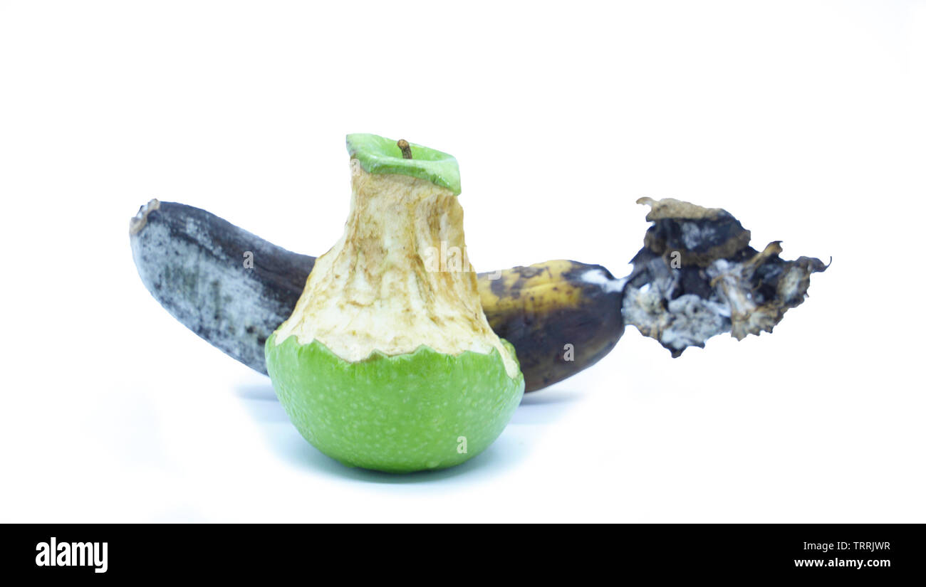 Green mouldy apple and rotten banana as concept of skin problems ...