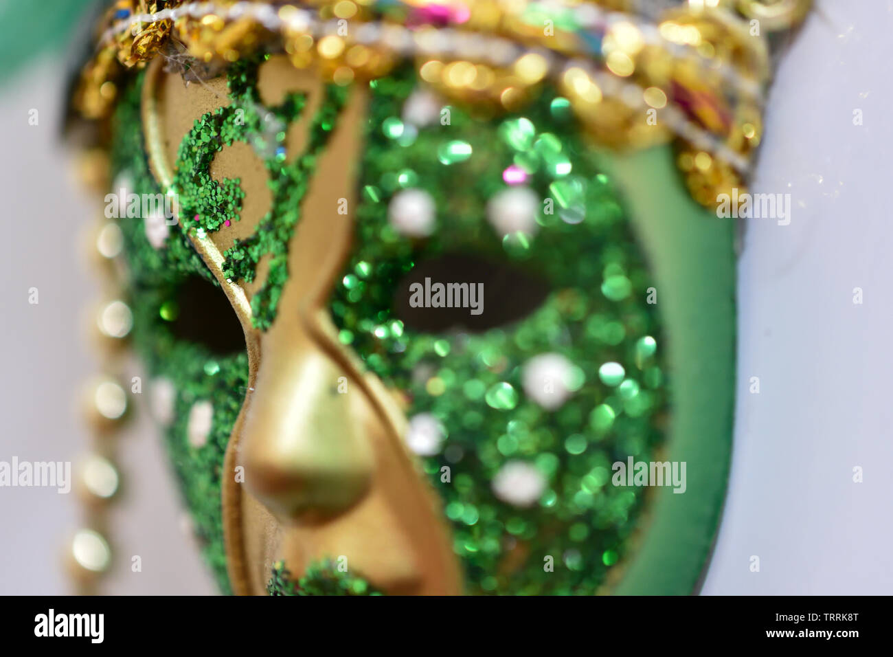 green carnival mask taken with macro lens Stock Photo - Alamy