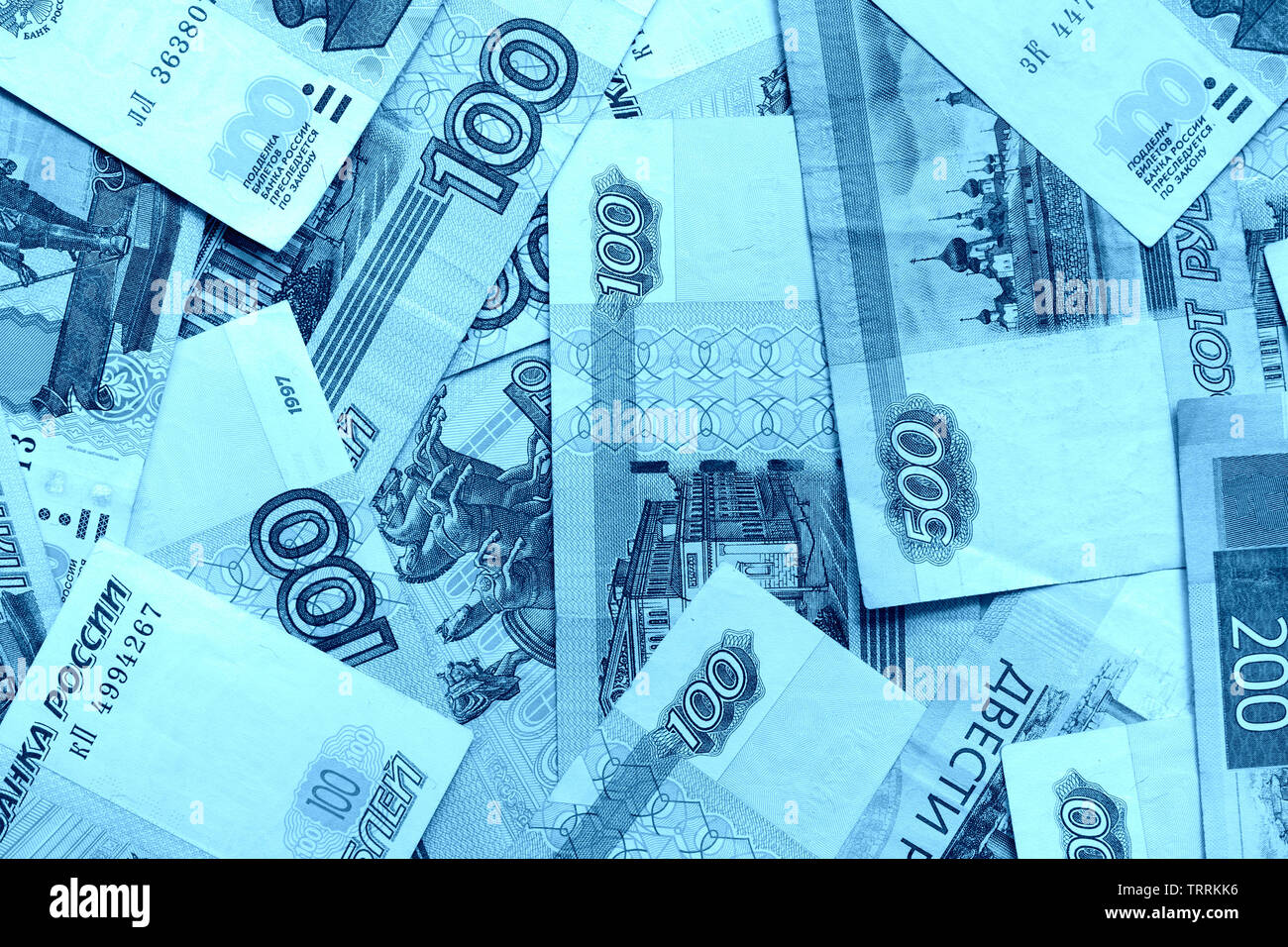 Different bills of Russian rubles close up. Money background blue color ...