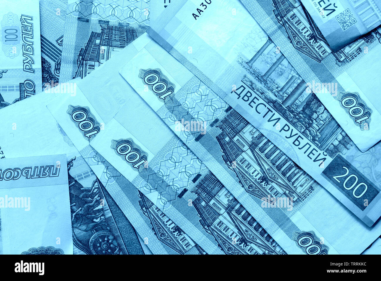 Different bills of Russian rubles close up. Money background blue color ...
