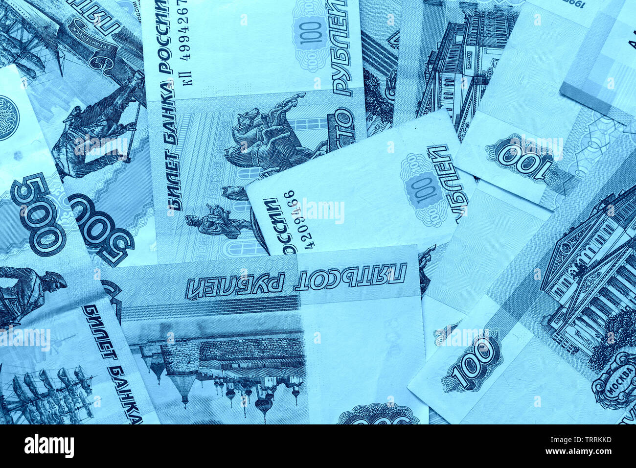 Different bills of Russian rubles close up. Money background blue color ...