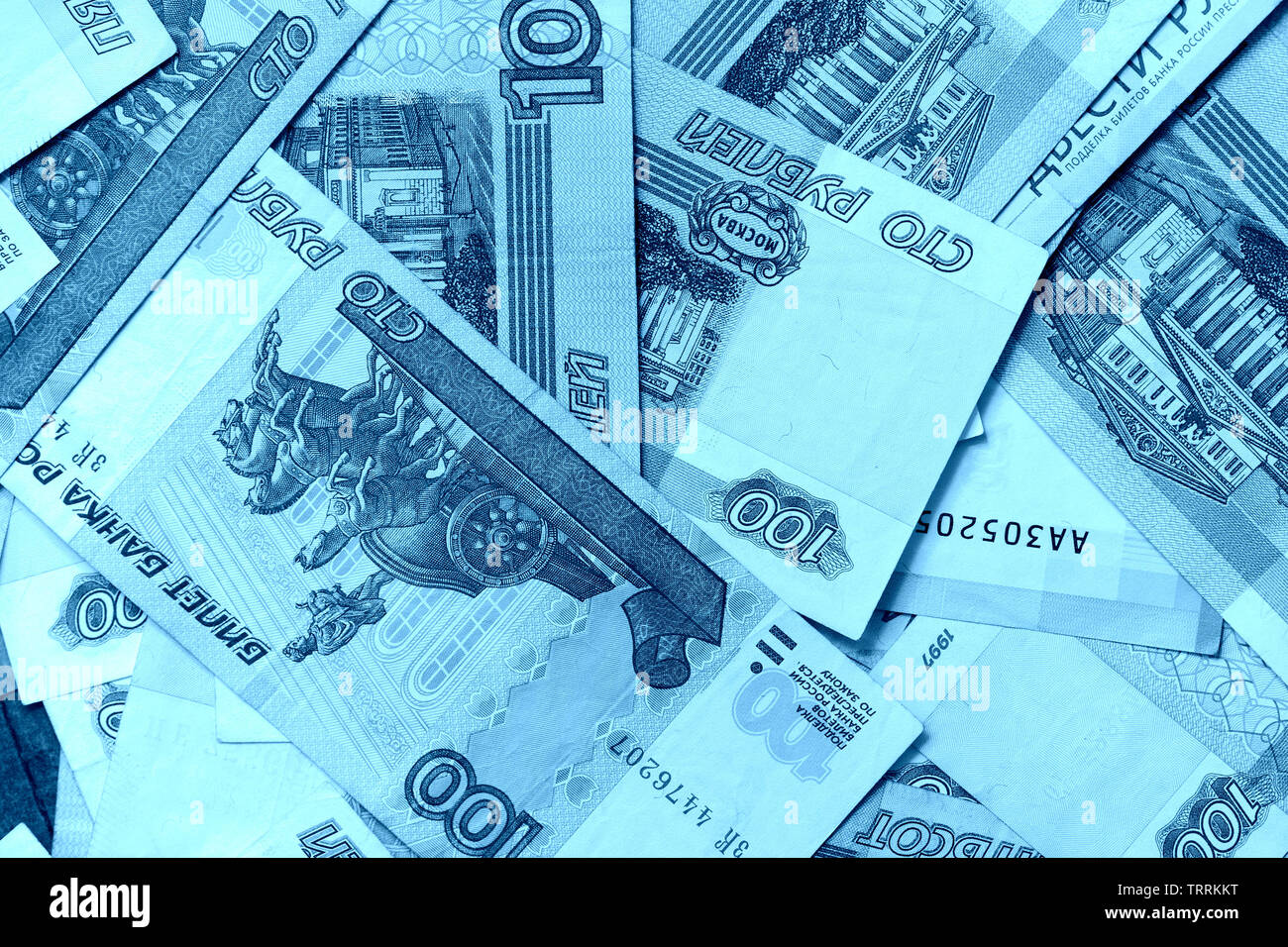 Different bills of Russian rubles close up. Money background blue color ...