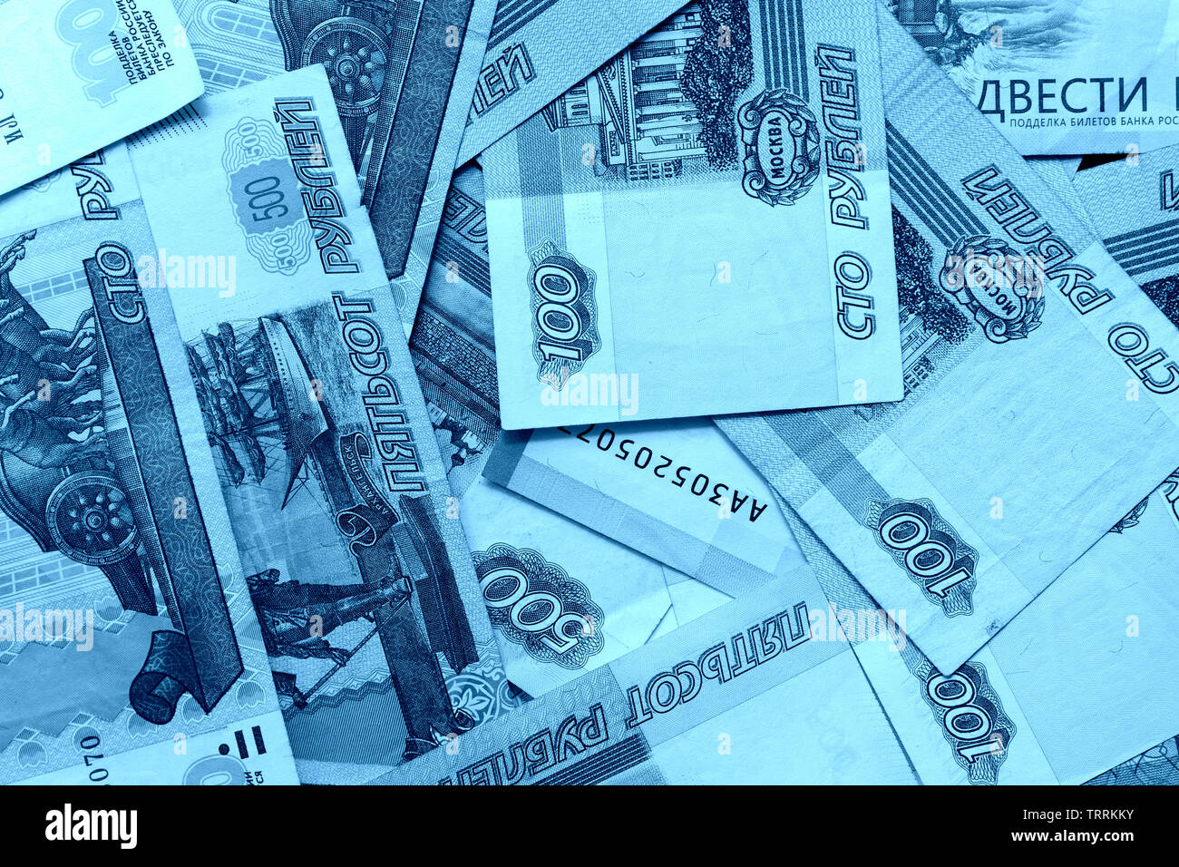 Different bills of Russian rubles close up. Money background blue color ...