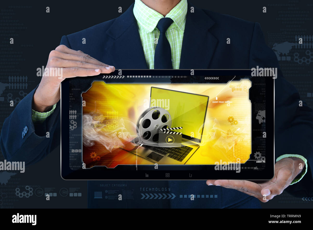 man showing Laptop with reel in frame Stock Photo - Alamy