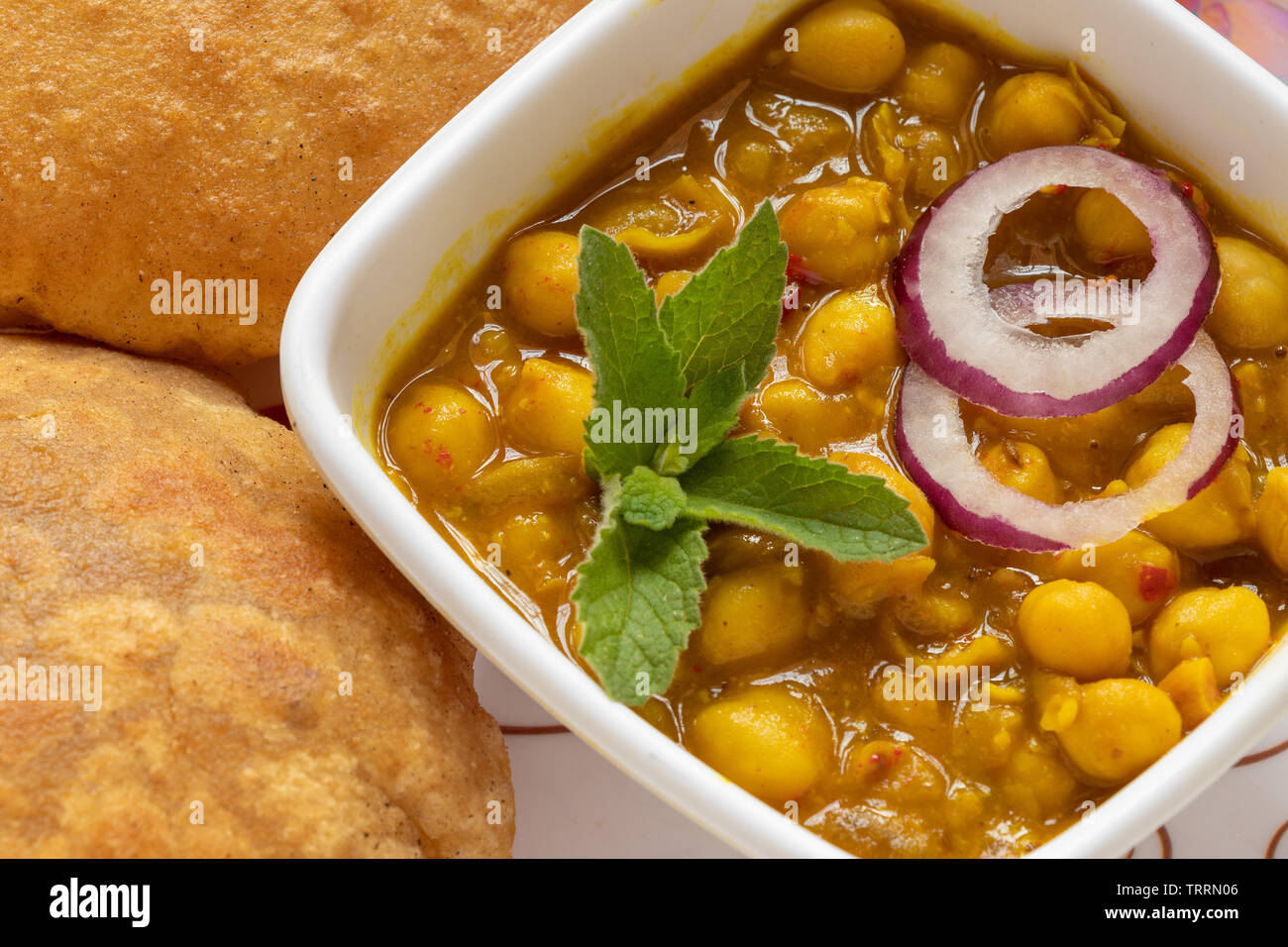 Chana Masala with Puri Indian Food, selective focus Stock Photo - Alamy