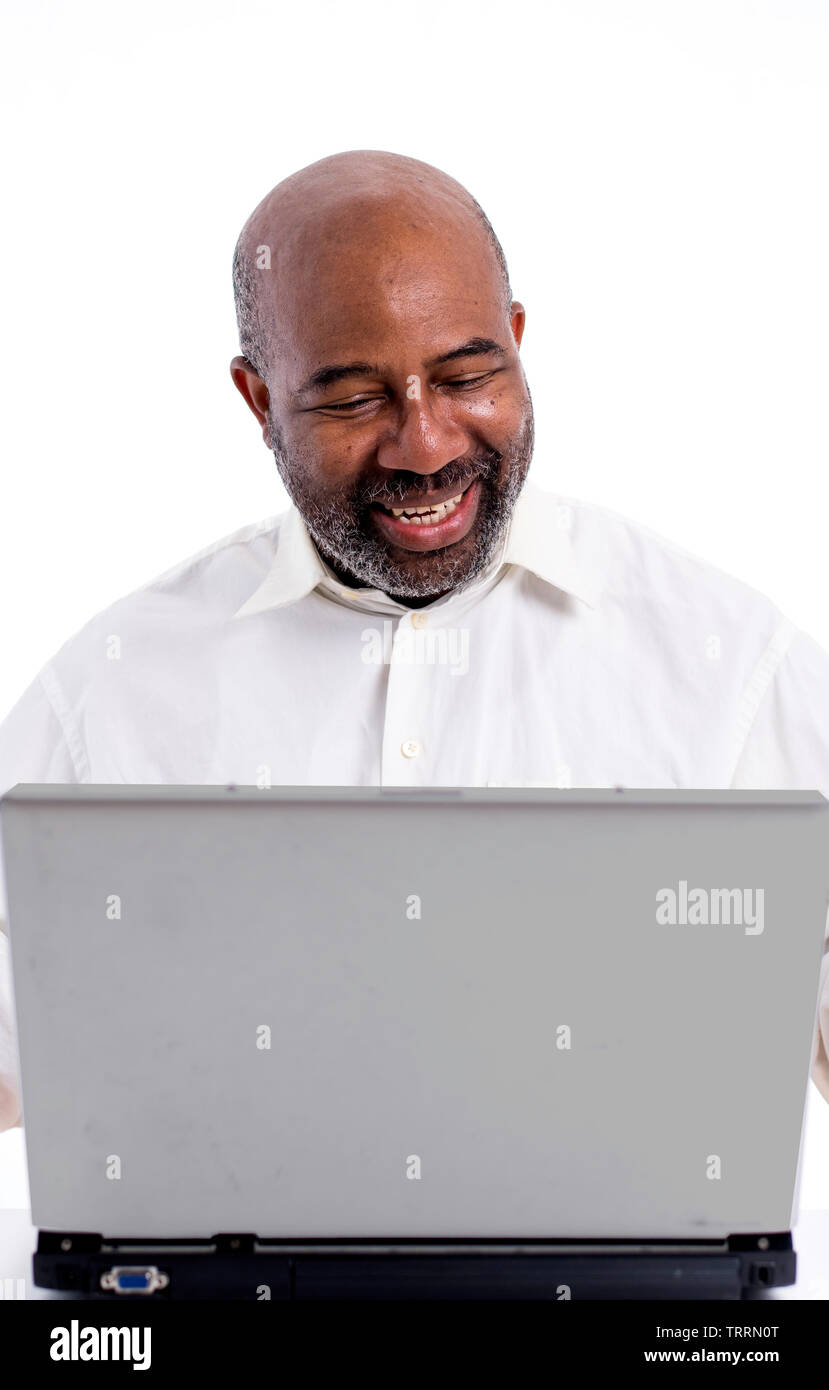 Portrait of cheerful African American software expert laughing while ...
