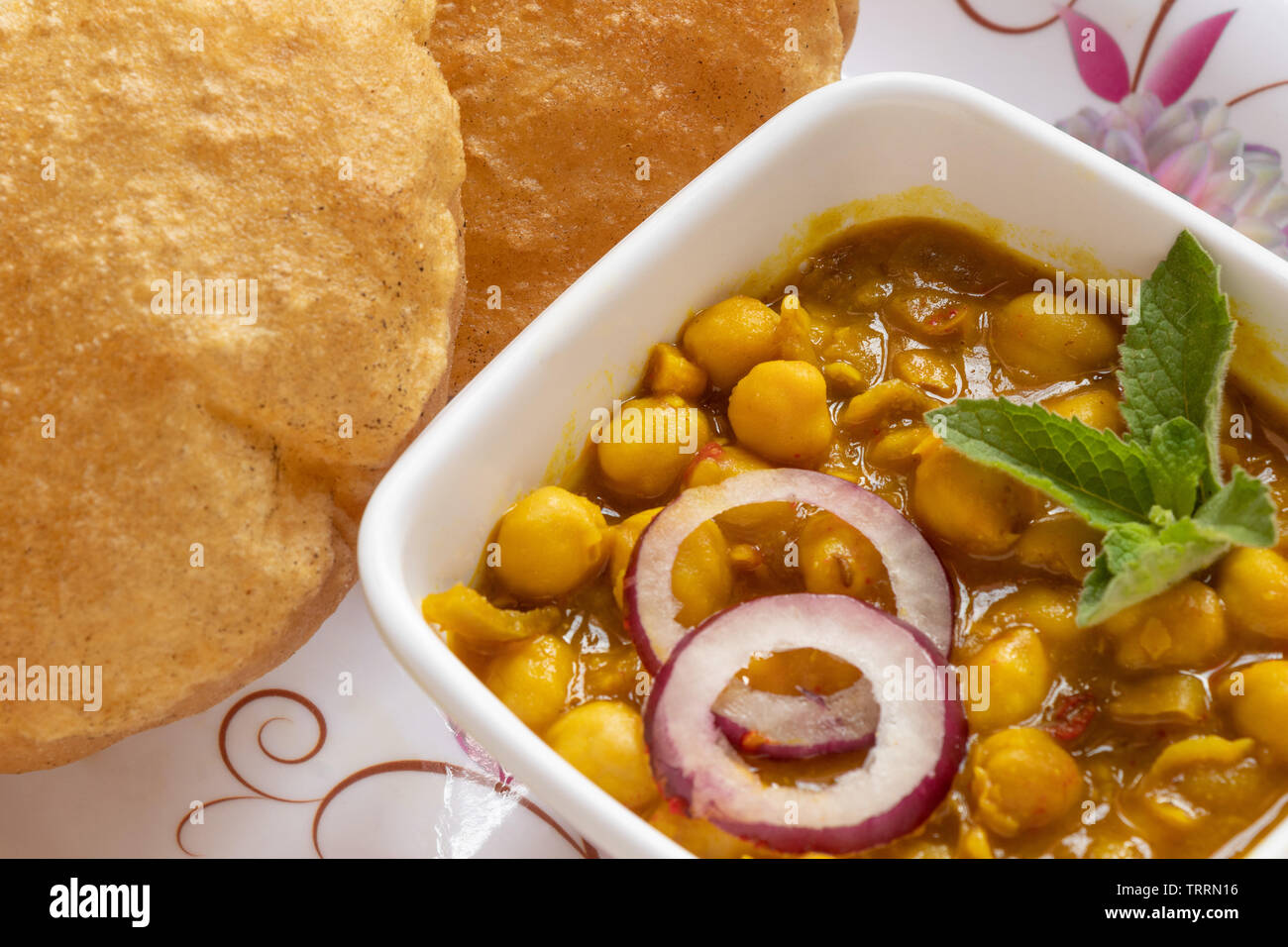 Chana Masala with Puri Indian Food, selective focus Stock Photo - Alamy