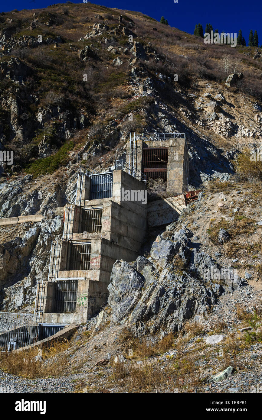 An old protection dam on mountain lake Stock Photo - Alamy