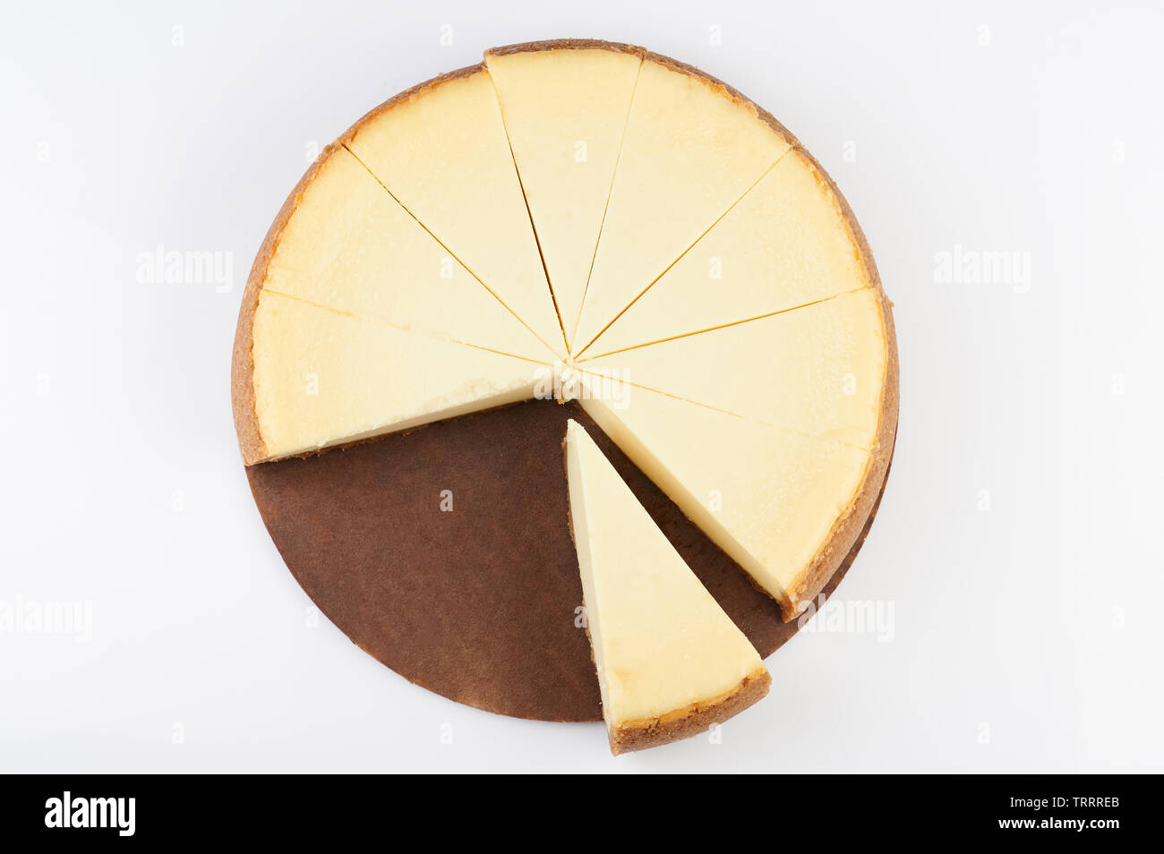 Sliced cheesecake pie above top view isolated Stock Photo - Alamy