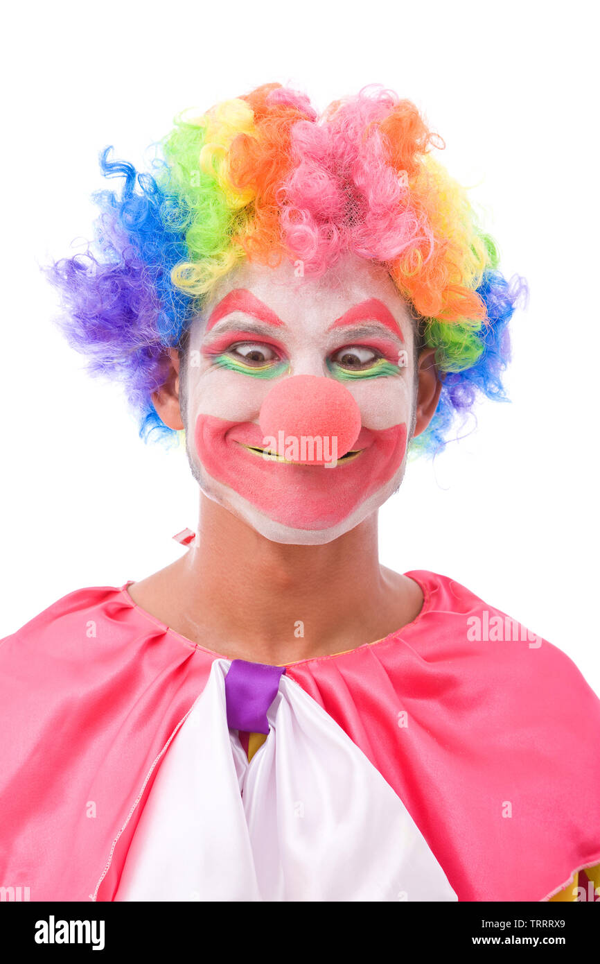 funny and colorful clown making a face on white background Stock Photo ...
