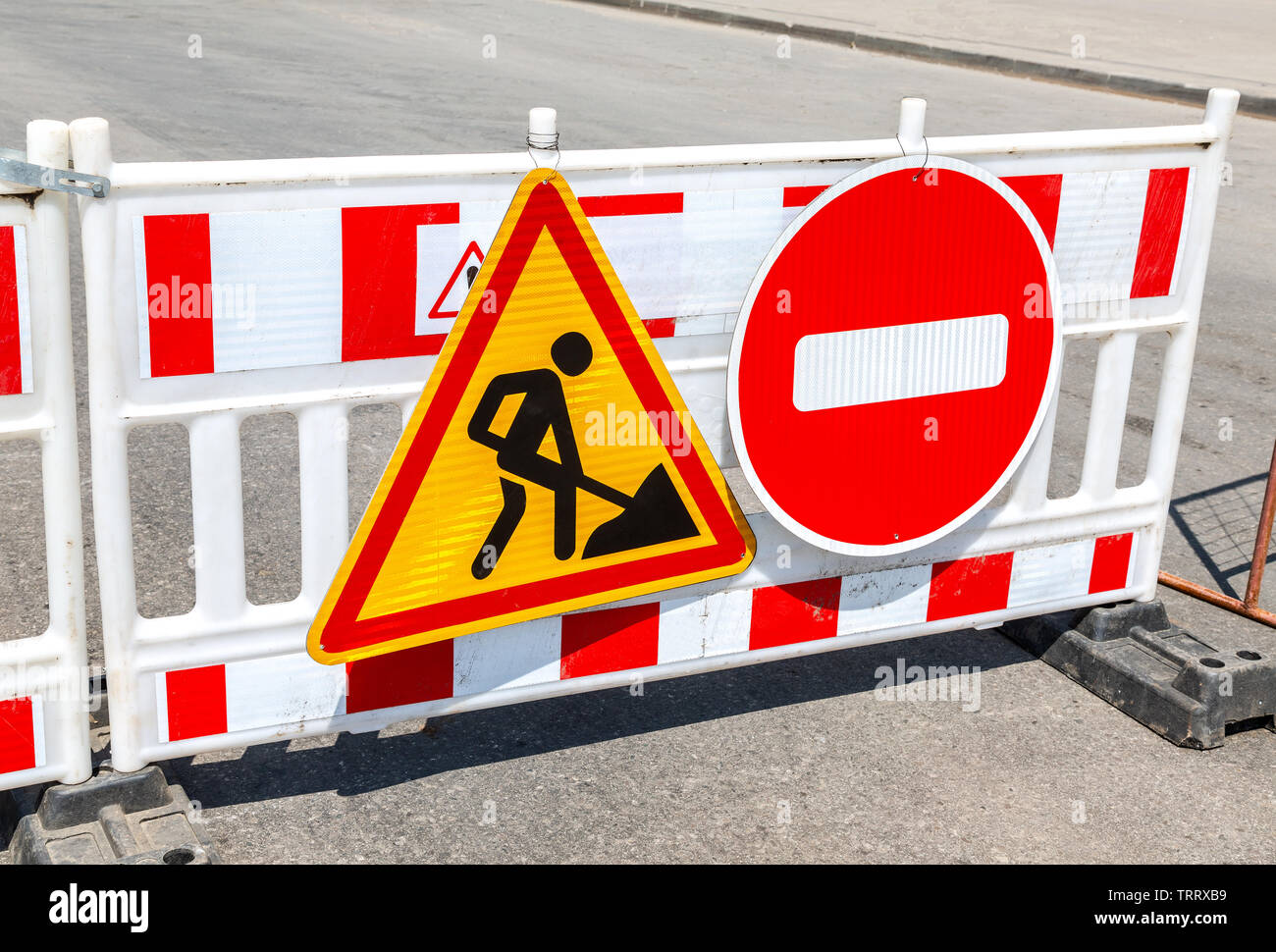 Road works traffic sign at the city street, stop sign Stock Photo - Alamy