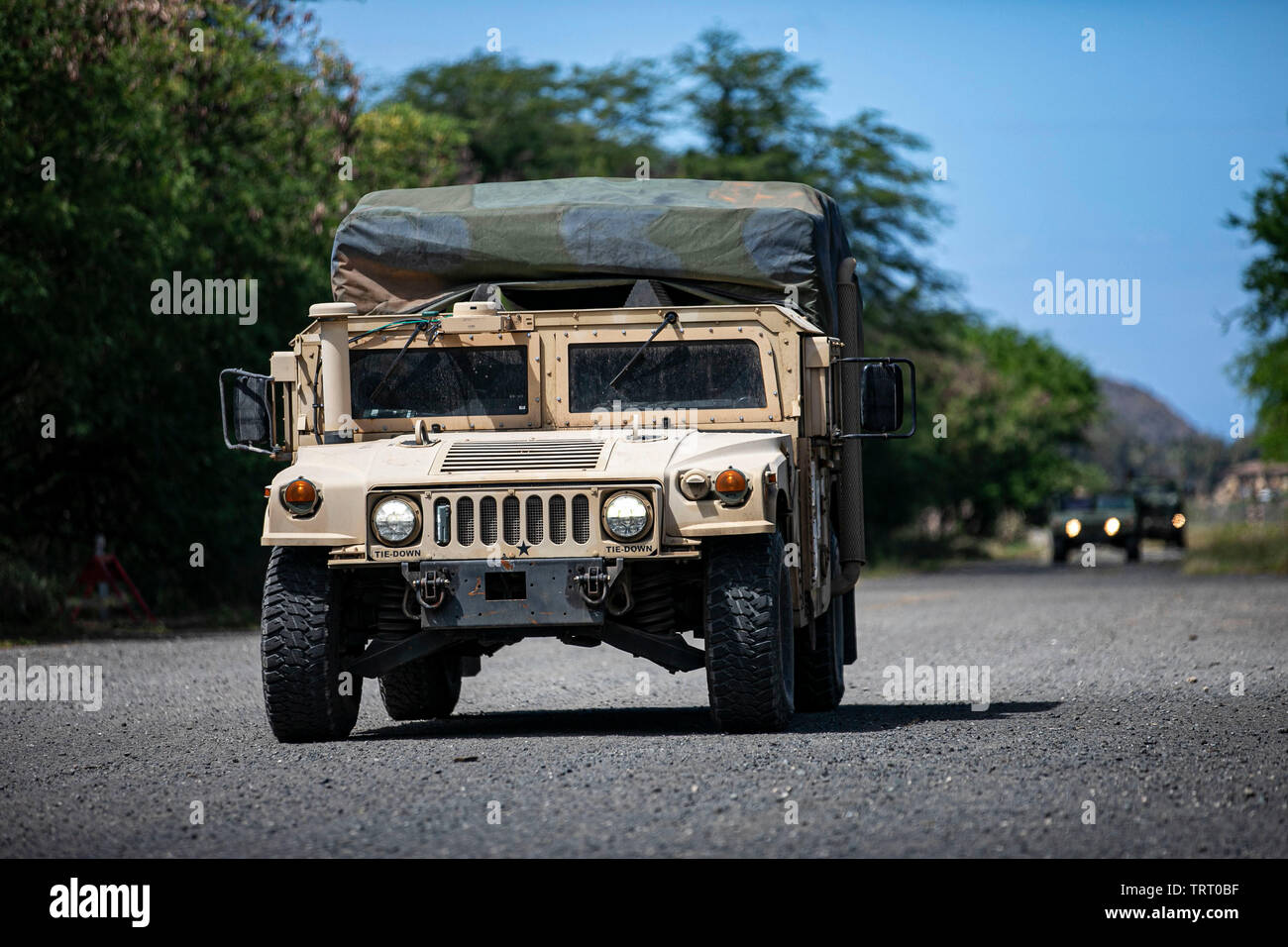 A U.S. Marine Corps High Mobility Multipurpose Wheeled Vehicle assigned ...