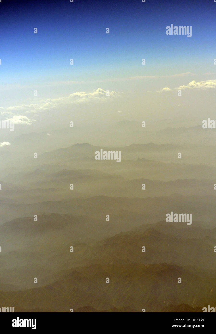 Flying high above the misty mountains of Sichuan Stock Photo - Alamy