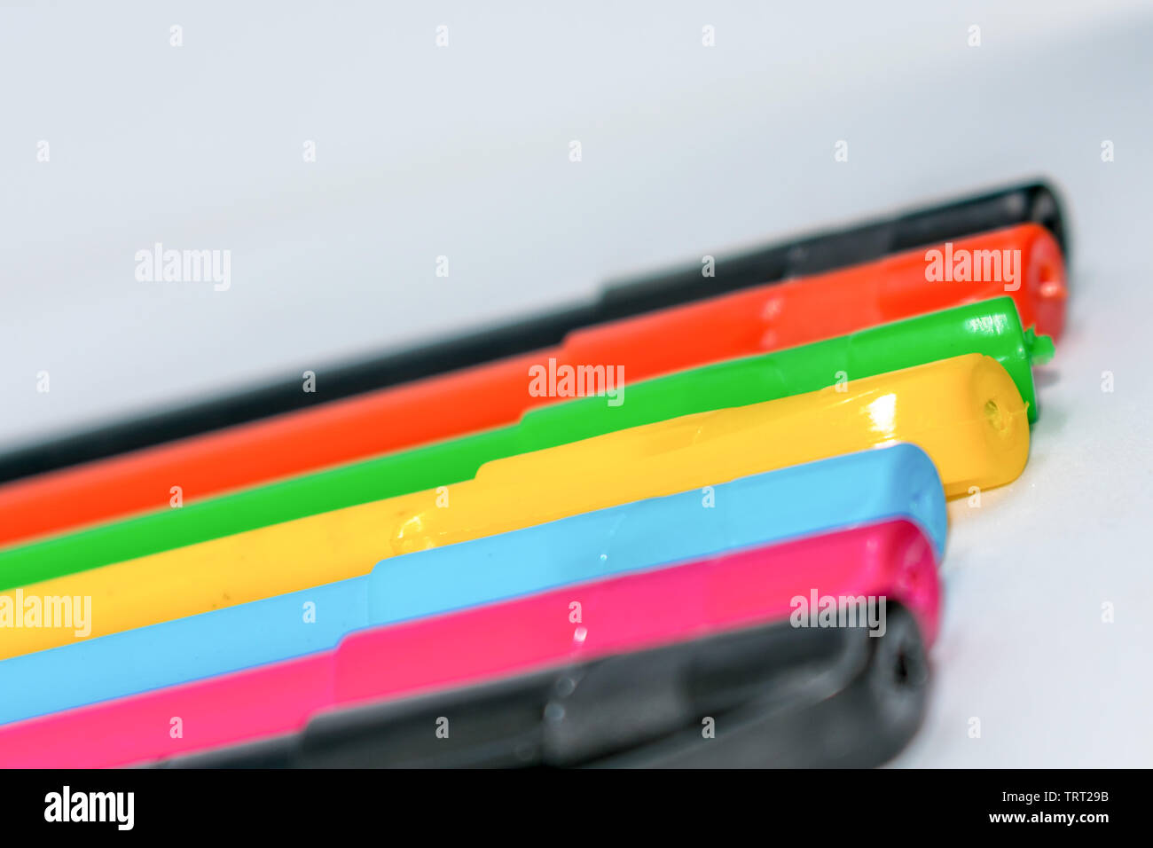 Standing Out From The Crowd Concept. Bunch of assorted multi colored ...