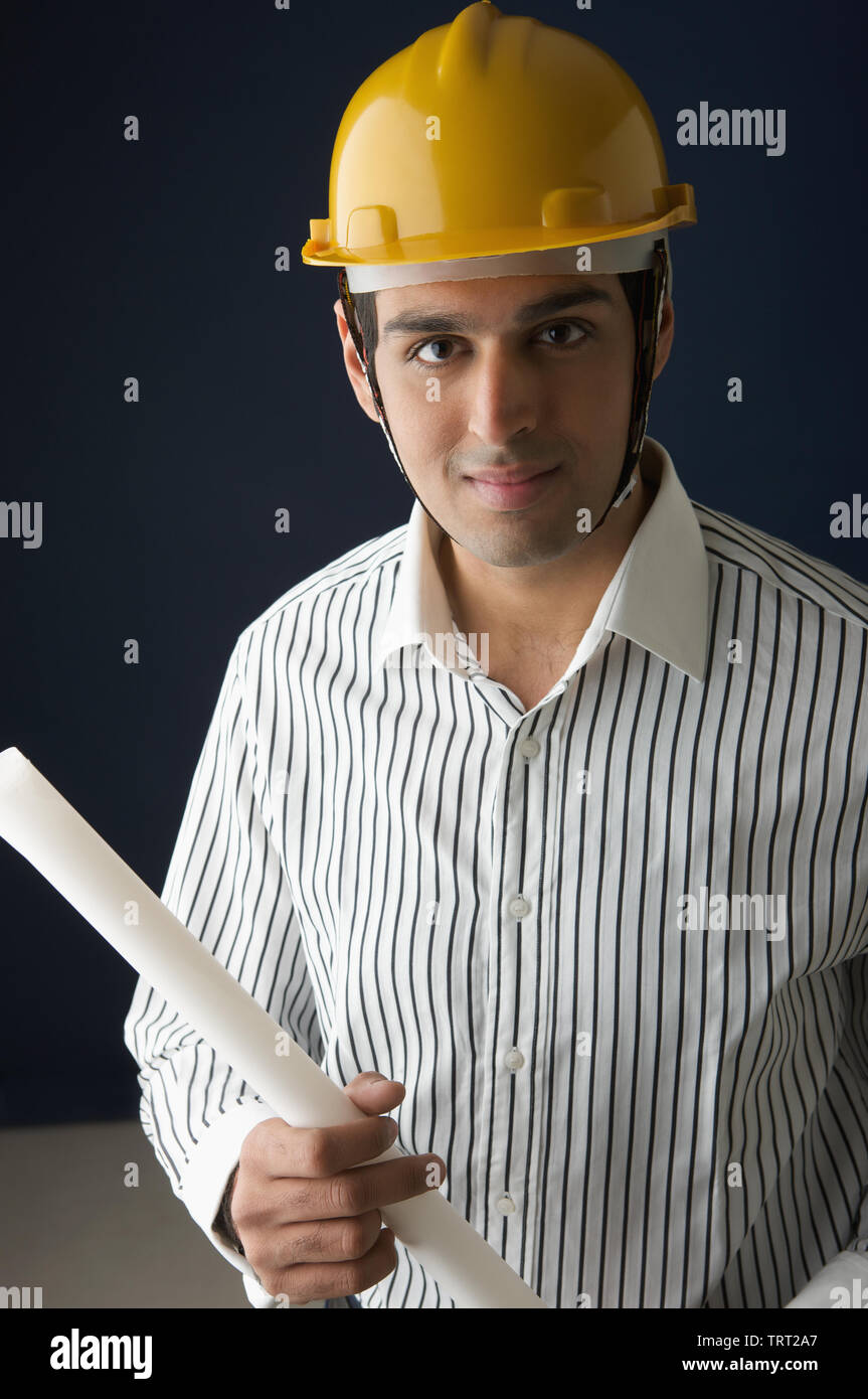 Architect building plans rolled up hi-res stock photography and images ...