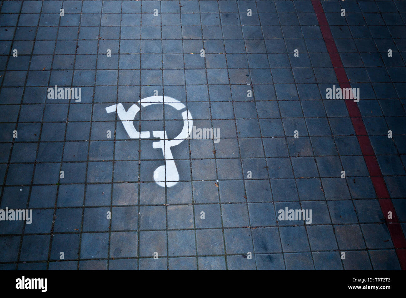 Wheelchair parking symbol on pavement hi-res stock photography and ...