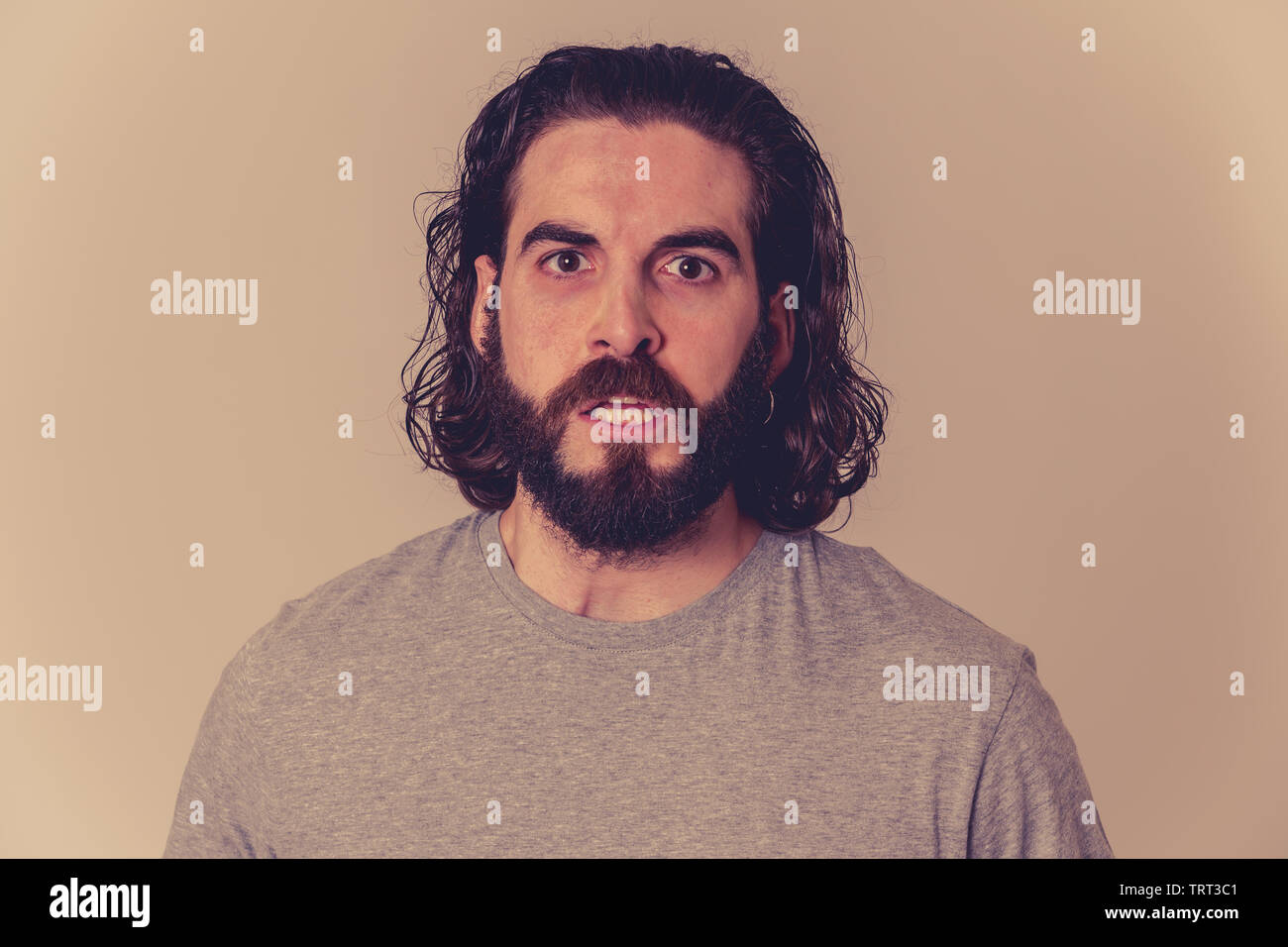 Portrait of angry and upset young hipster man looking furious ...