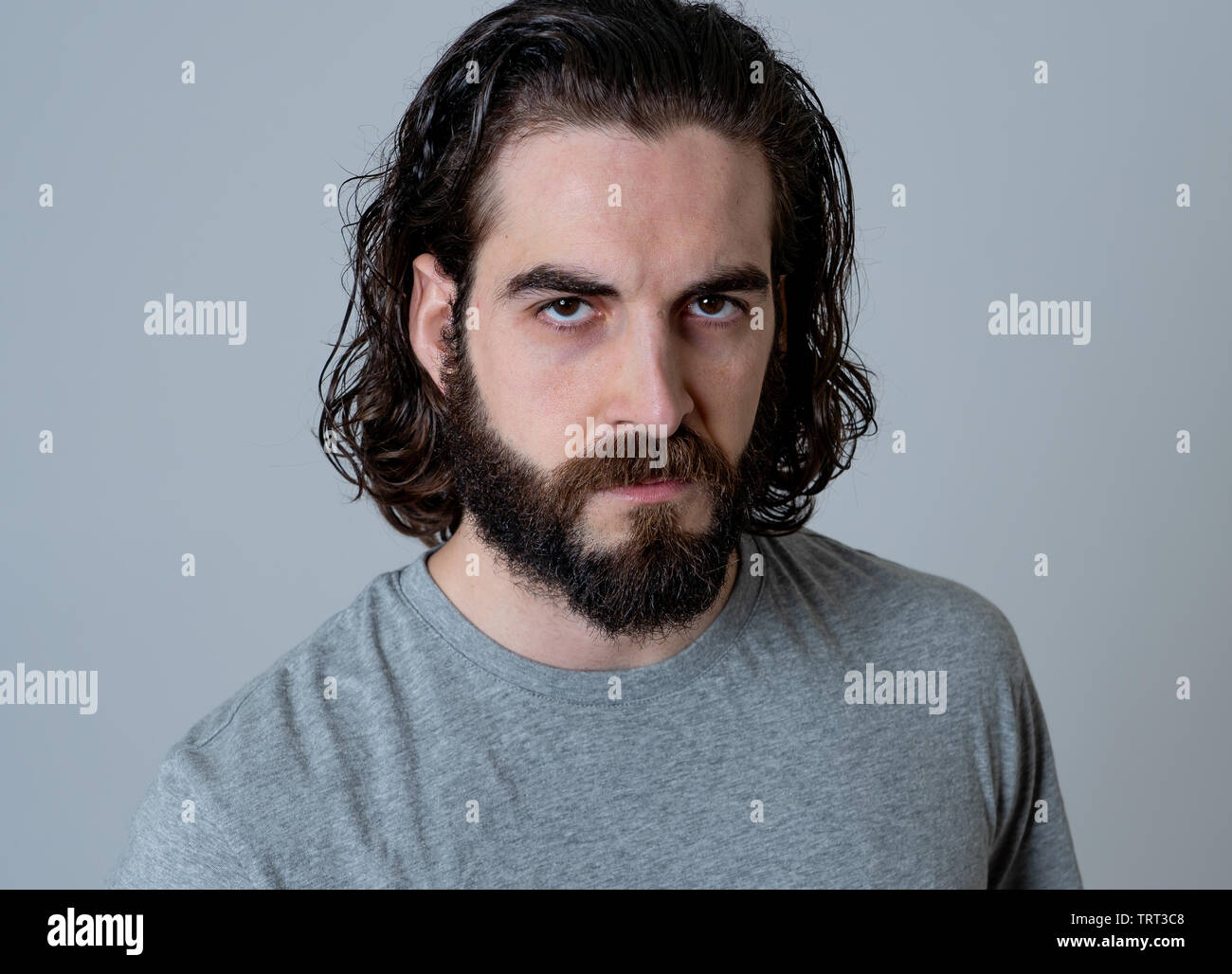 Portrait of angry and upset young hipster man looking furious ...