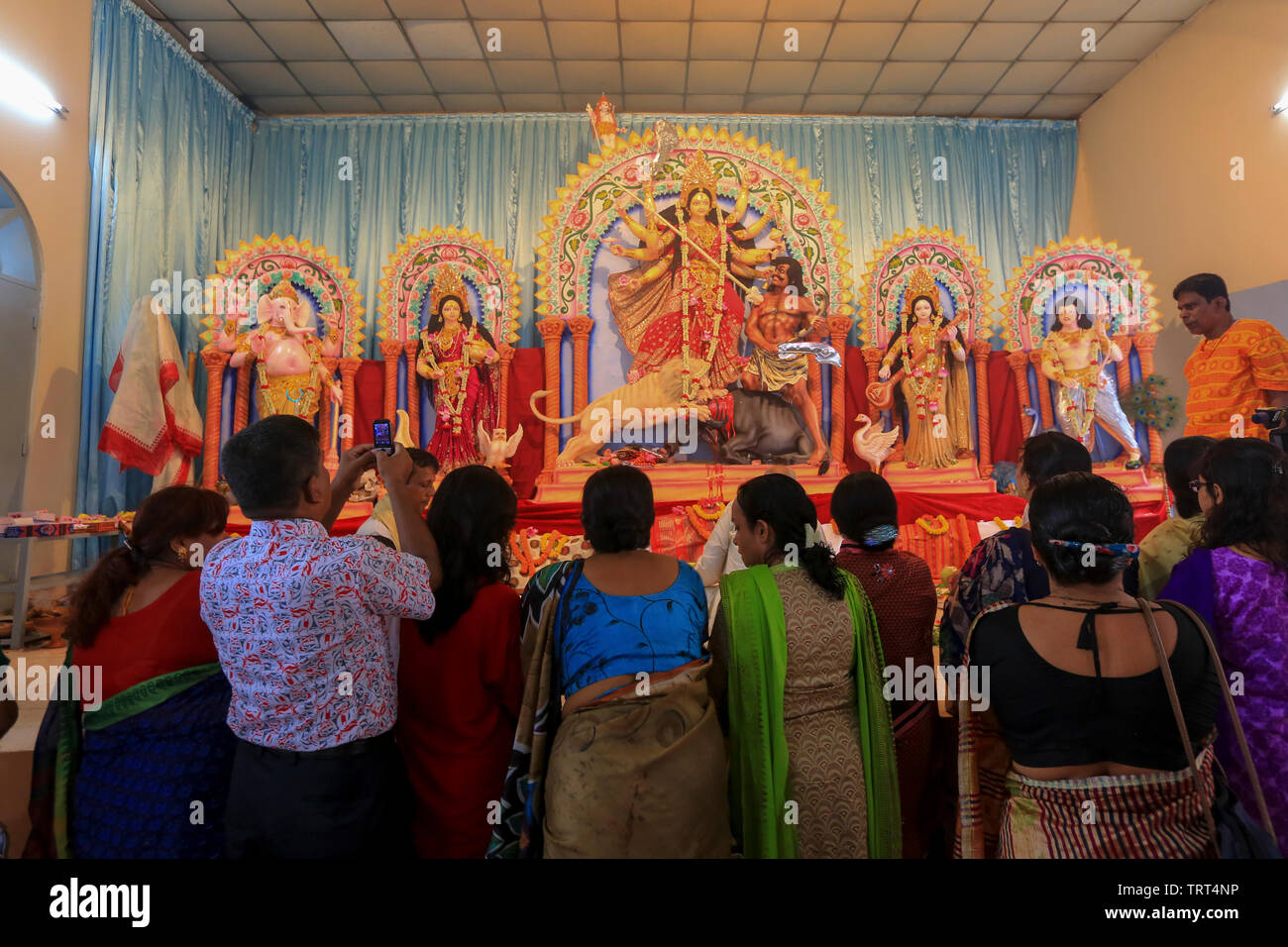Hindu community people offer prayers as part of the rituals during the ...