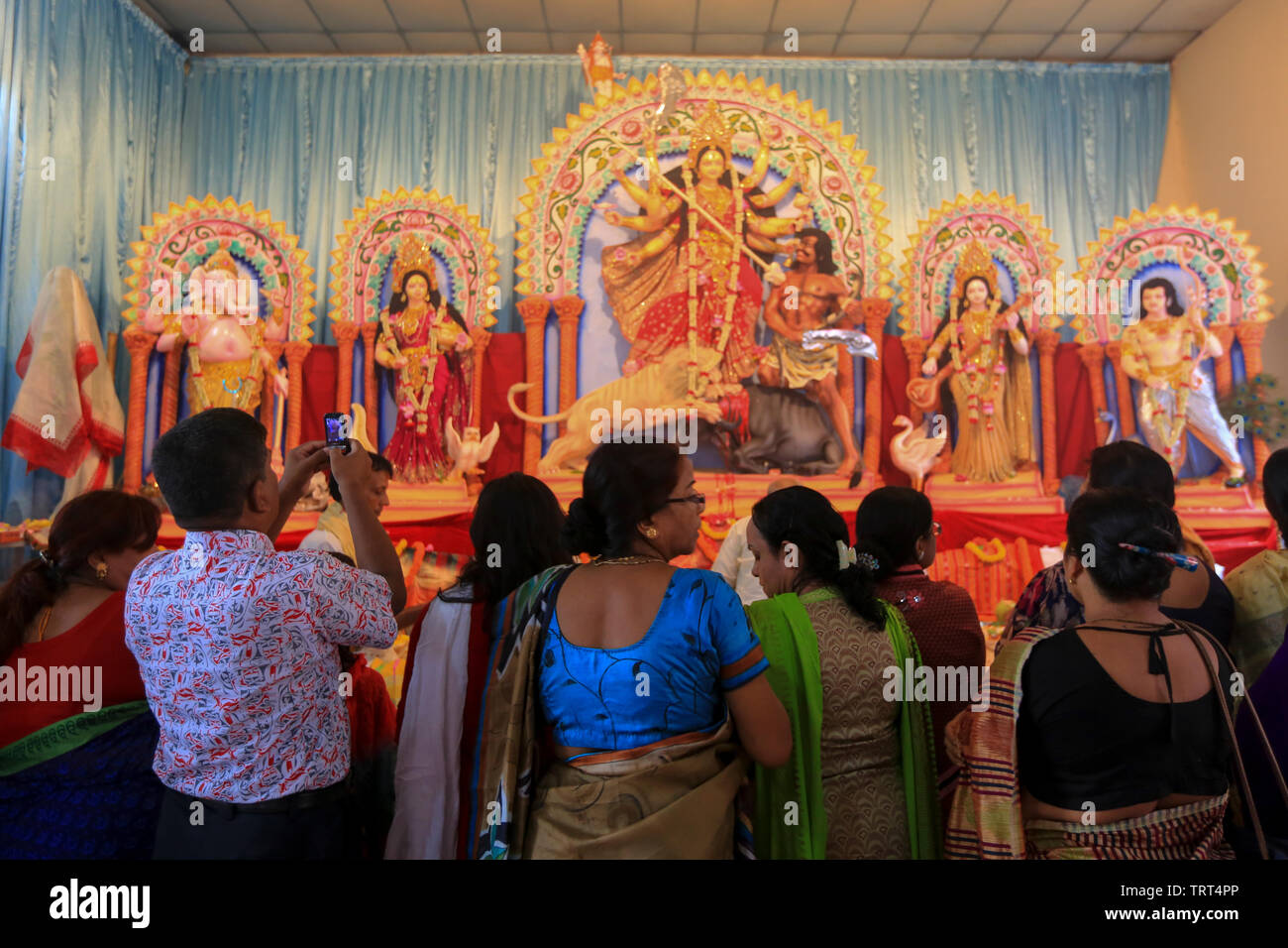 Hindu community people offer prayers as part of the rituals during the ...