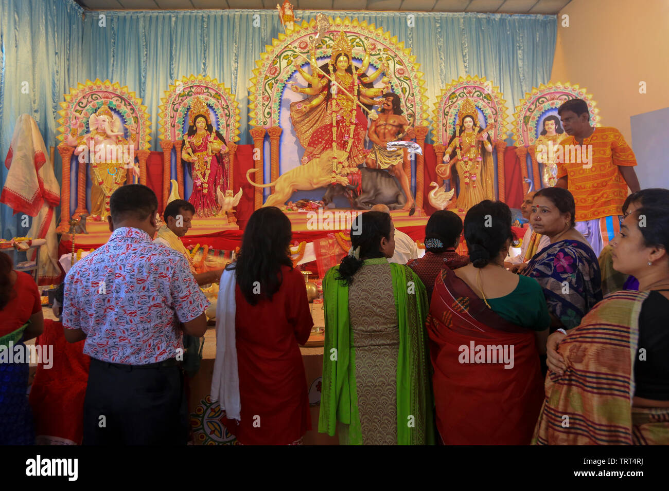Hindu community people offer prayers as part of the rituals during the ...