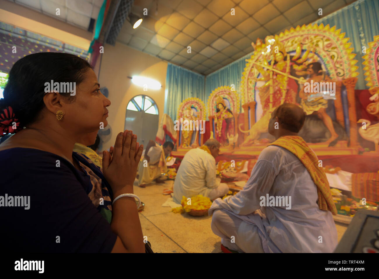 Hindu community people offer prayers as part of the rituals during the ...