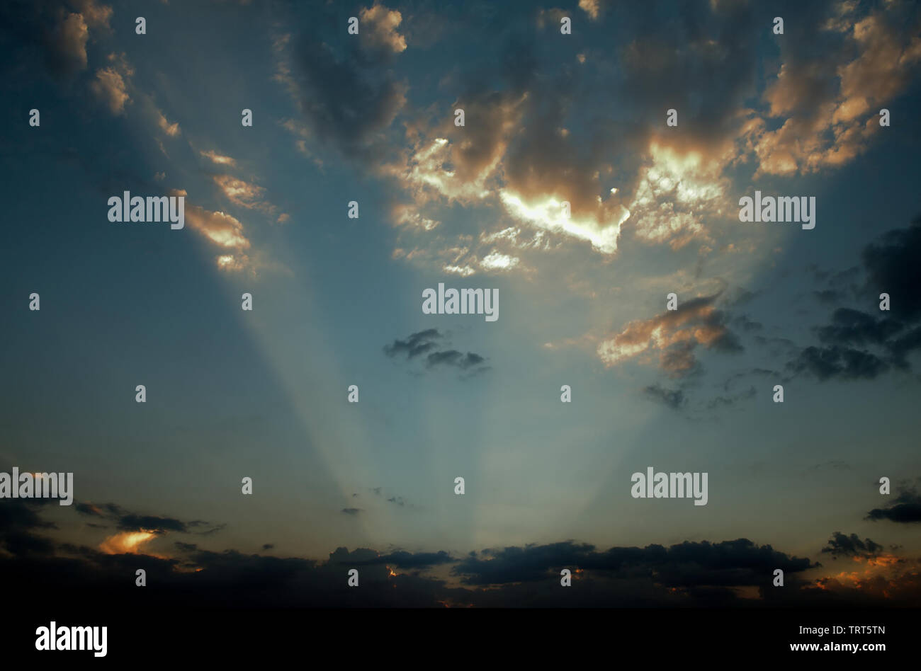 Light rays across dark sky Stock Photo - Alamy