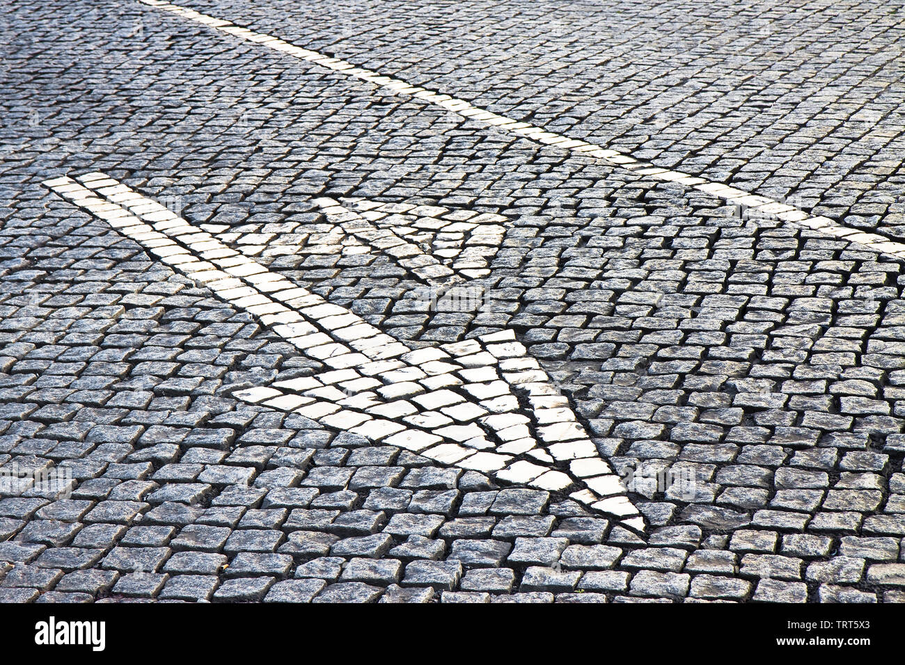 White arrow on stone hi-res stock photography and images - Alamy