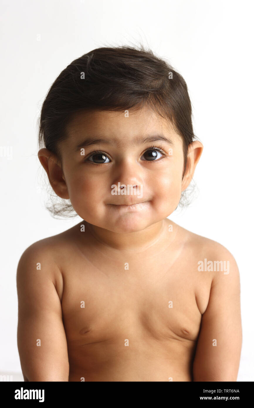 Portrait of an Indian baby boy making a face Stock Photo - Alamy