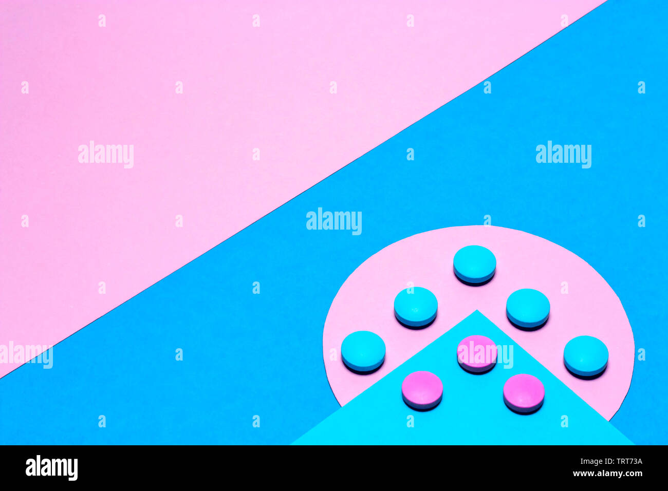 Pink pills in form triangle hi-res stock photography and images - Alamy