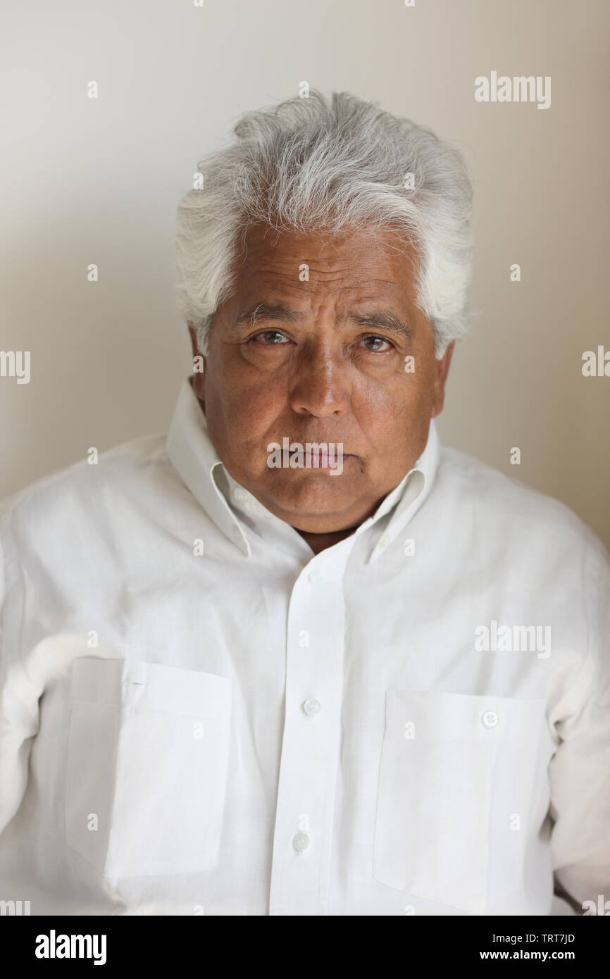 Indian grumpy man serious sulking hi-res stock photography and images ...