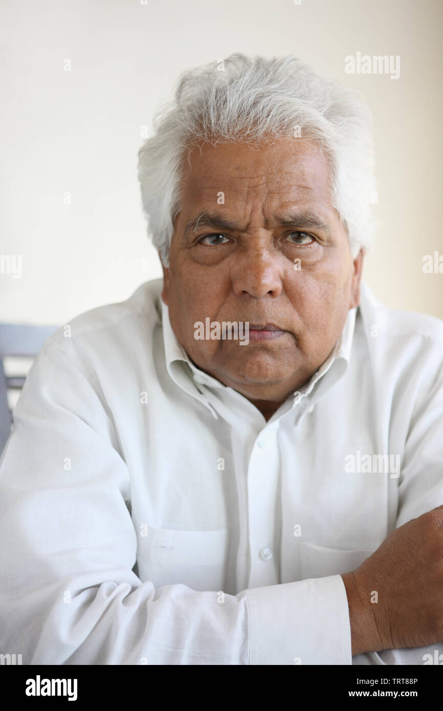 Indian grumpy man serious sulking hi-res stock photography and images ...