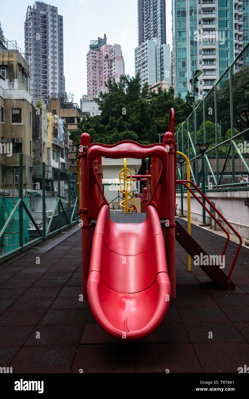 Hong Kong, China - 07 September 2018: Red slide on a playground in Hong ...