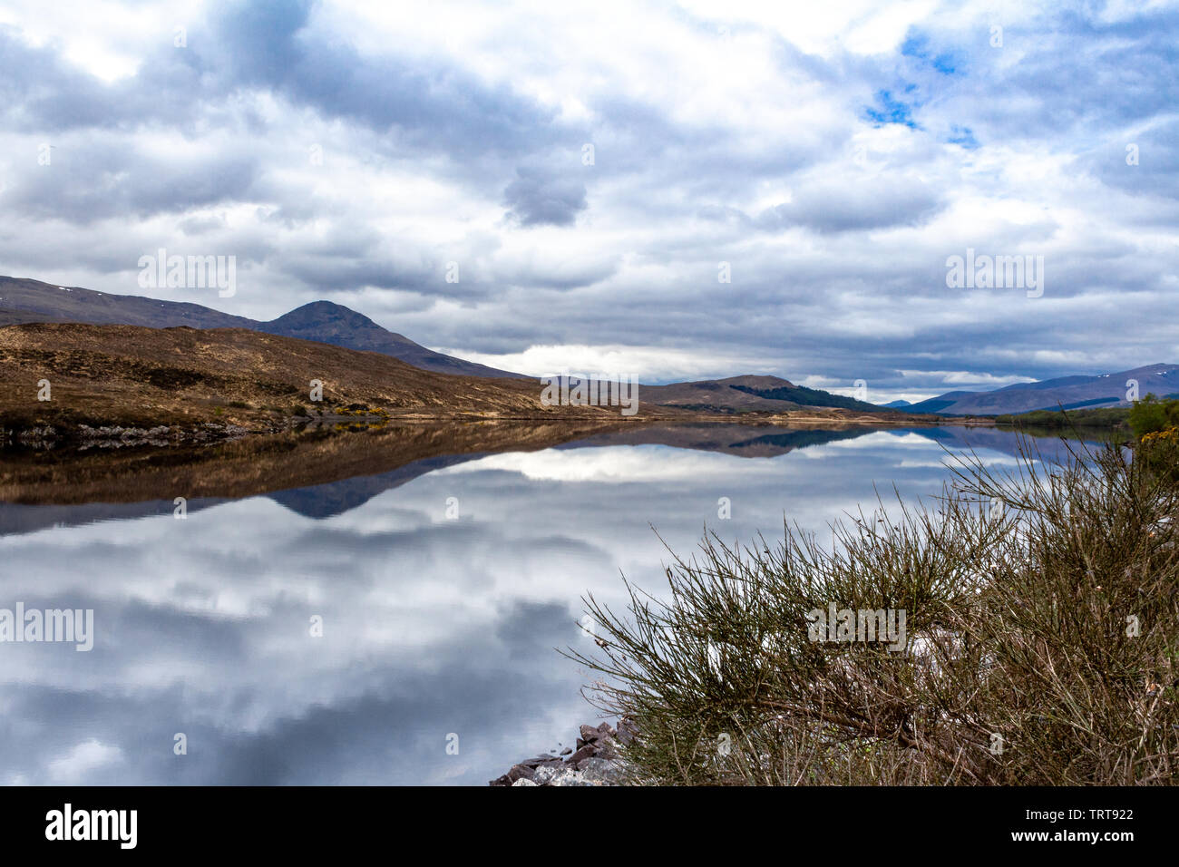 Reflecting Clouds on Water Stock Photo - Alamy