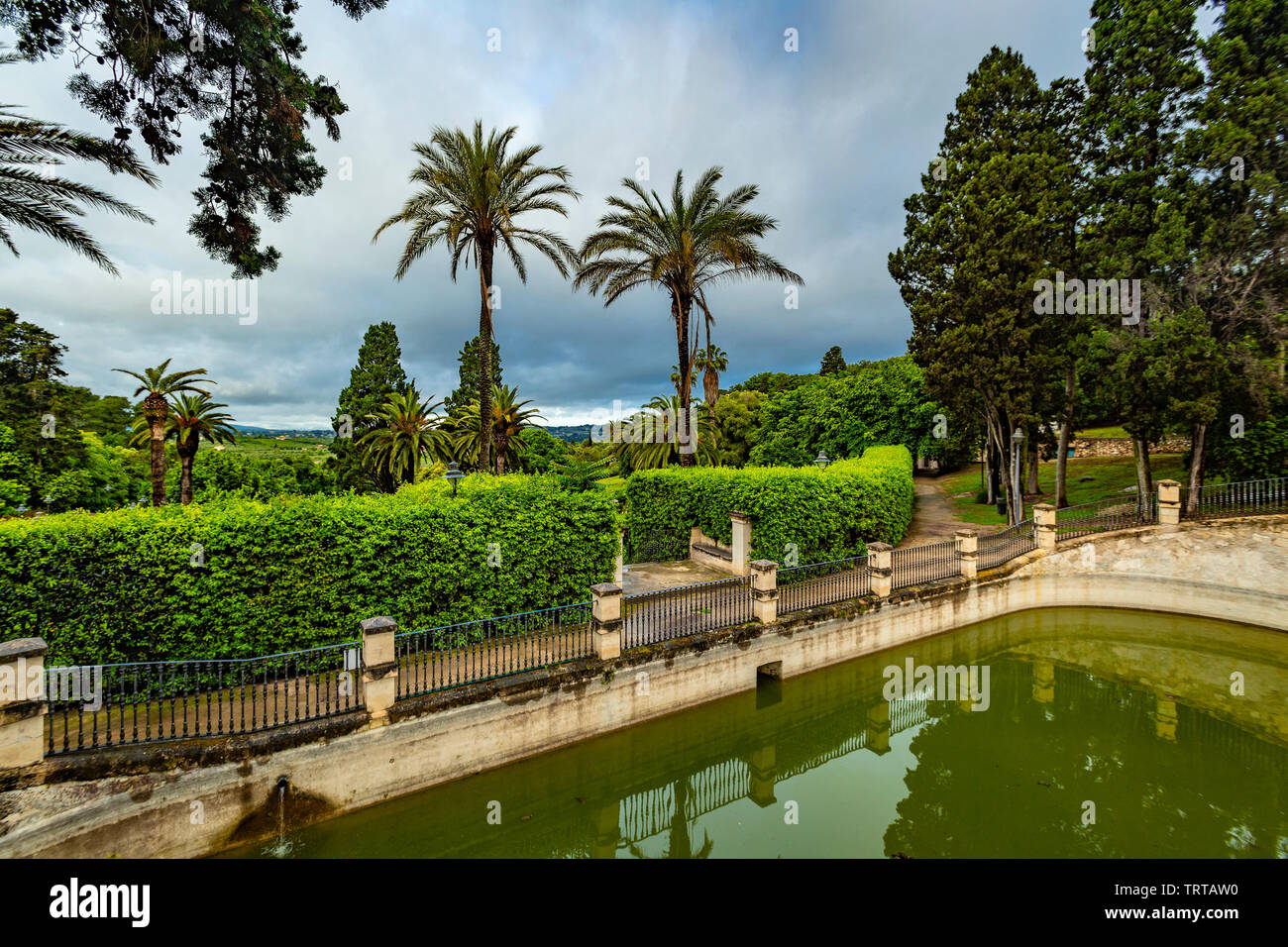 Italy Sardinia Sassari Monserrato Park entrance, bordered by cypresses ...