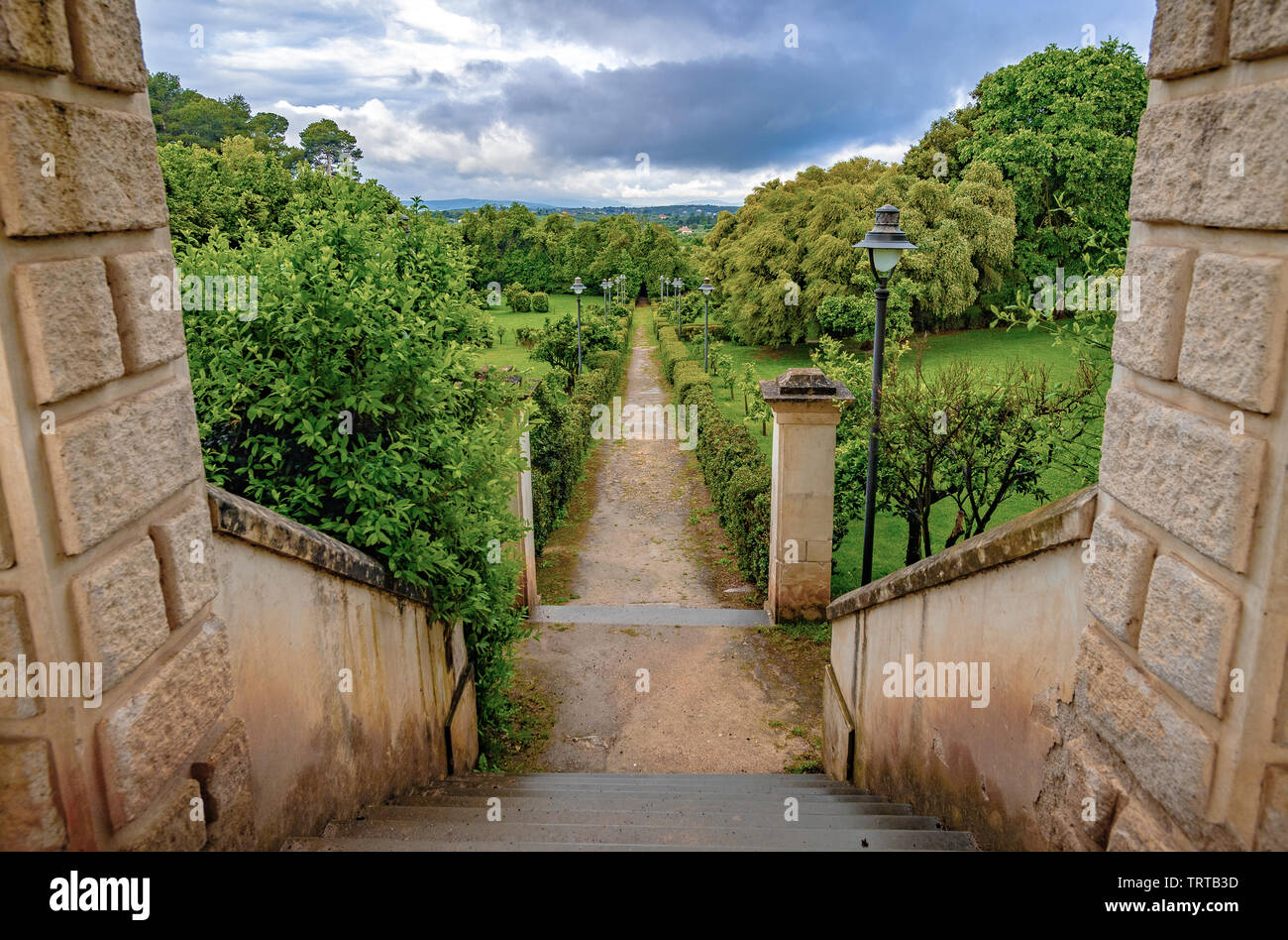 Italy Sardinia Sassari Monserrato Park stairs garden with cypress, palm ...