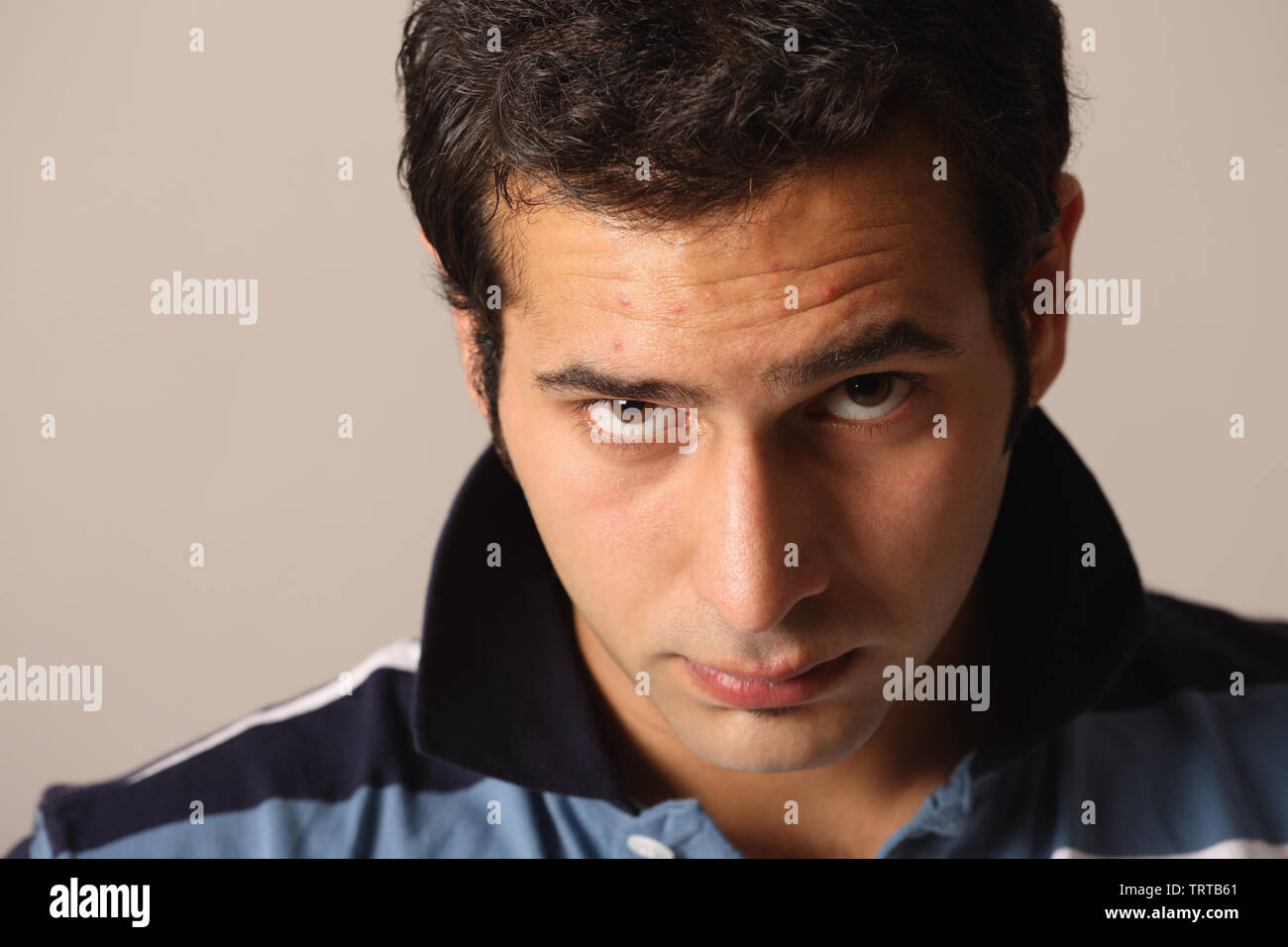 Portrait of a serious man Stock Photo - Alamy