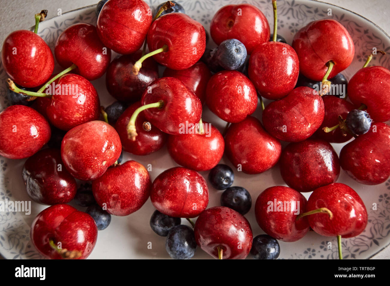 Cherries background hi-res stock photography and images - Alamy