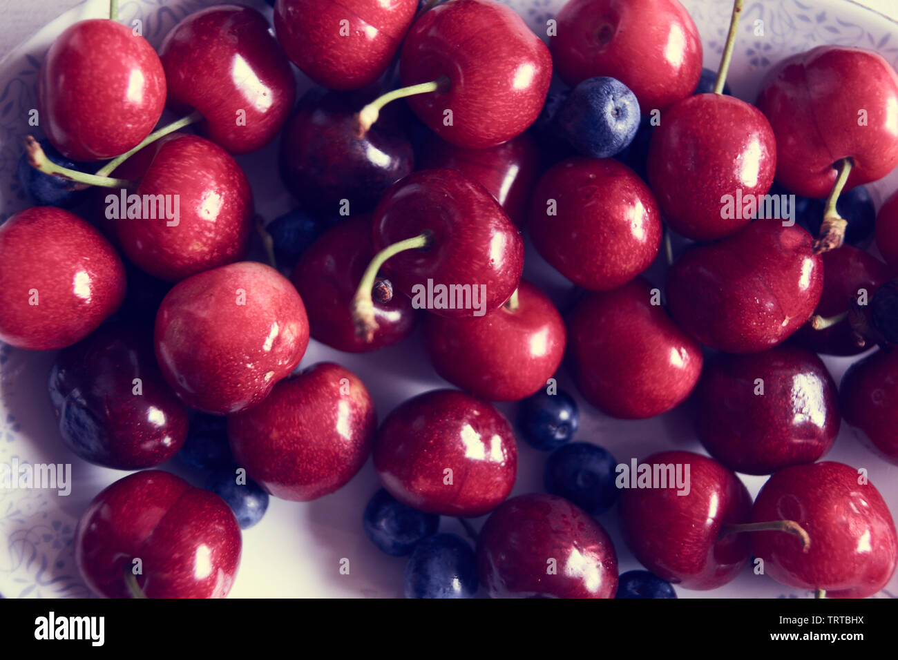 Cherries background hi-res stock photography and images - Alamy