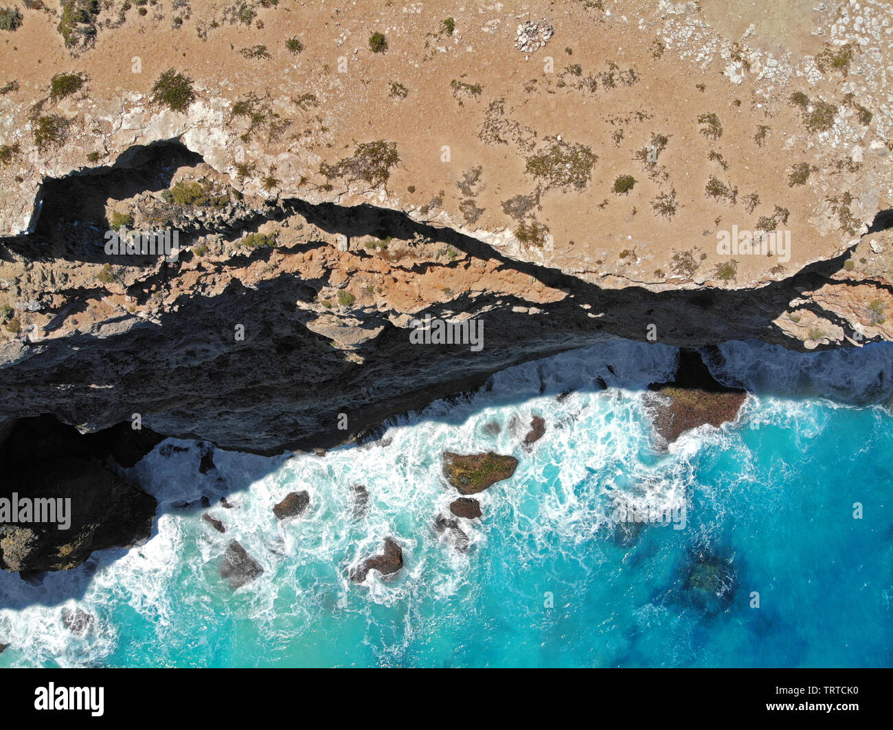 A Lookdown on a cliff from the eye of the drone Stock Photo - Alamy