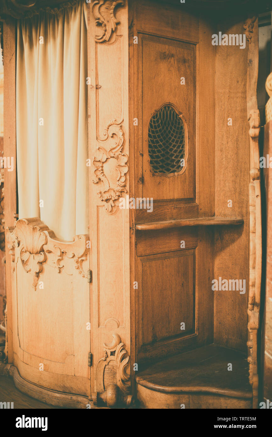 Image of a old wooden confessional in a church Stock Photo - Alamy