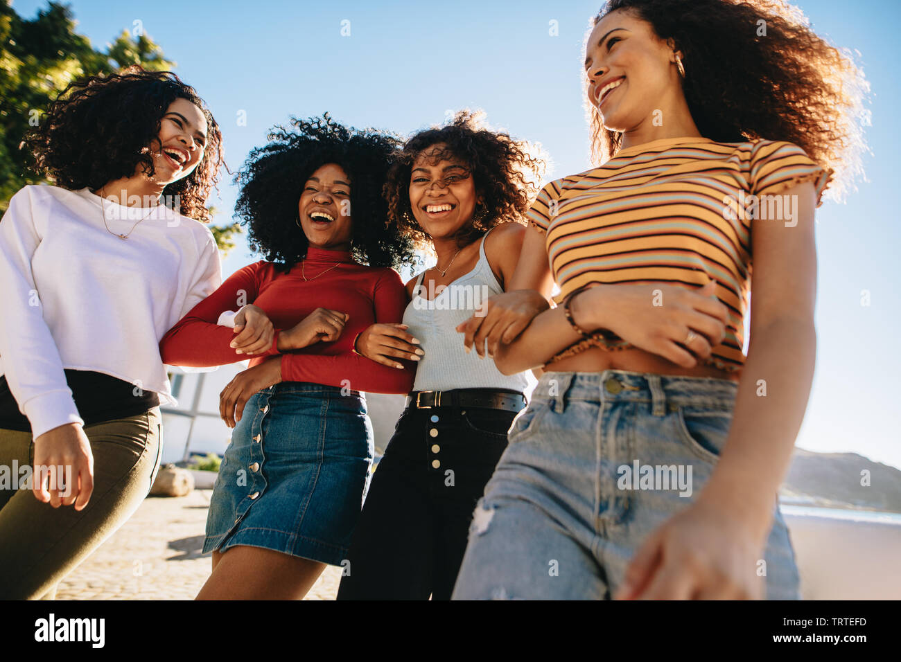 Four women friends beach hi-res stock photography and images - Alamy
