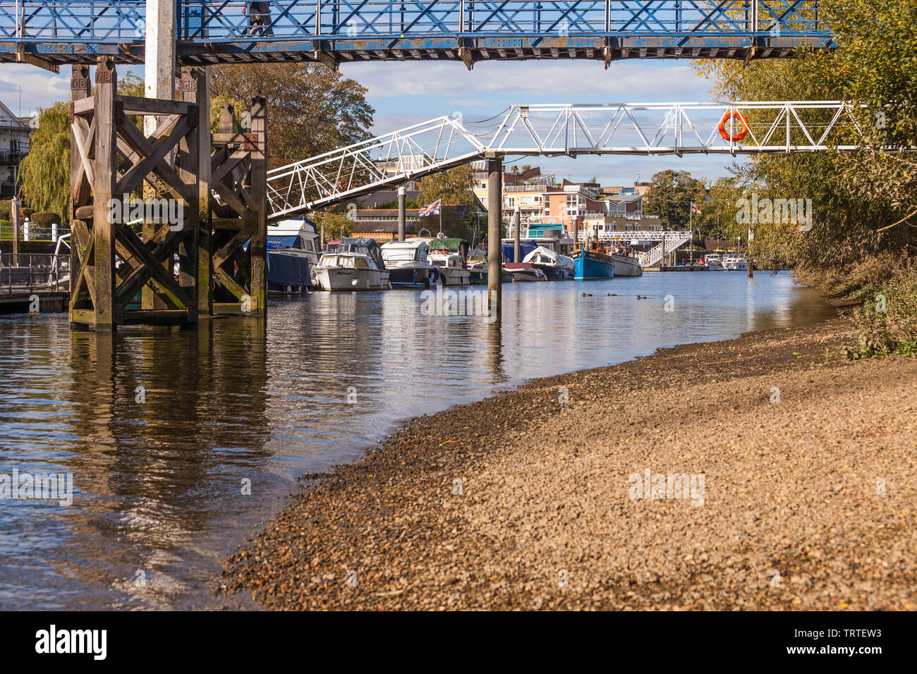 A scenic view of the riverside and footbridges at Teddington,England,UK ...